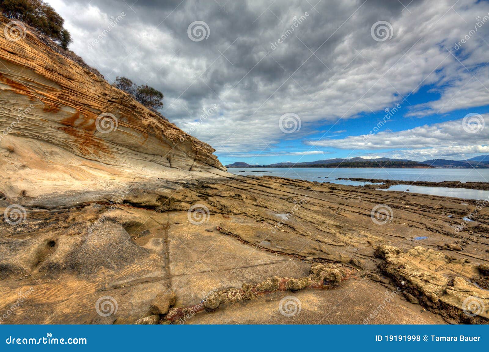 Sandstone beach stock photo. Image of beach, ocean, cliff - 19191998