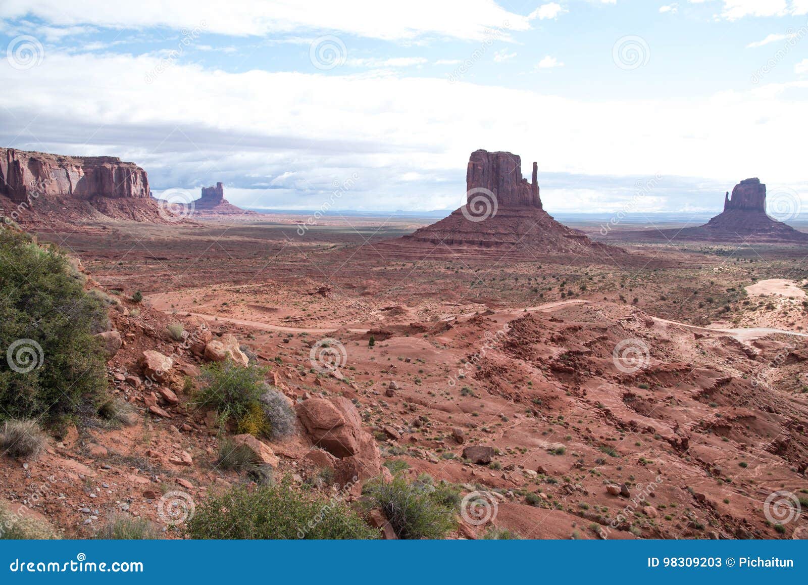 Sandstone buttes stock image. Image of clouds, road, stone - 98309203