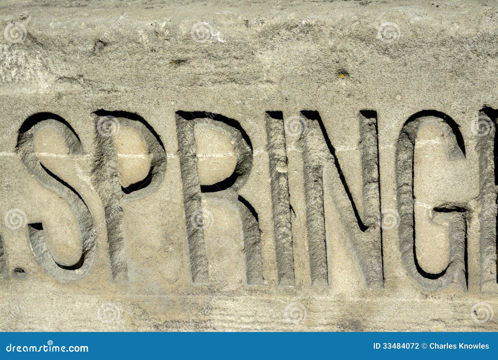 Sandstone Carved with the Word SPRING Stock Photo - Image of shadows ...