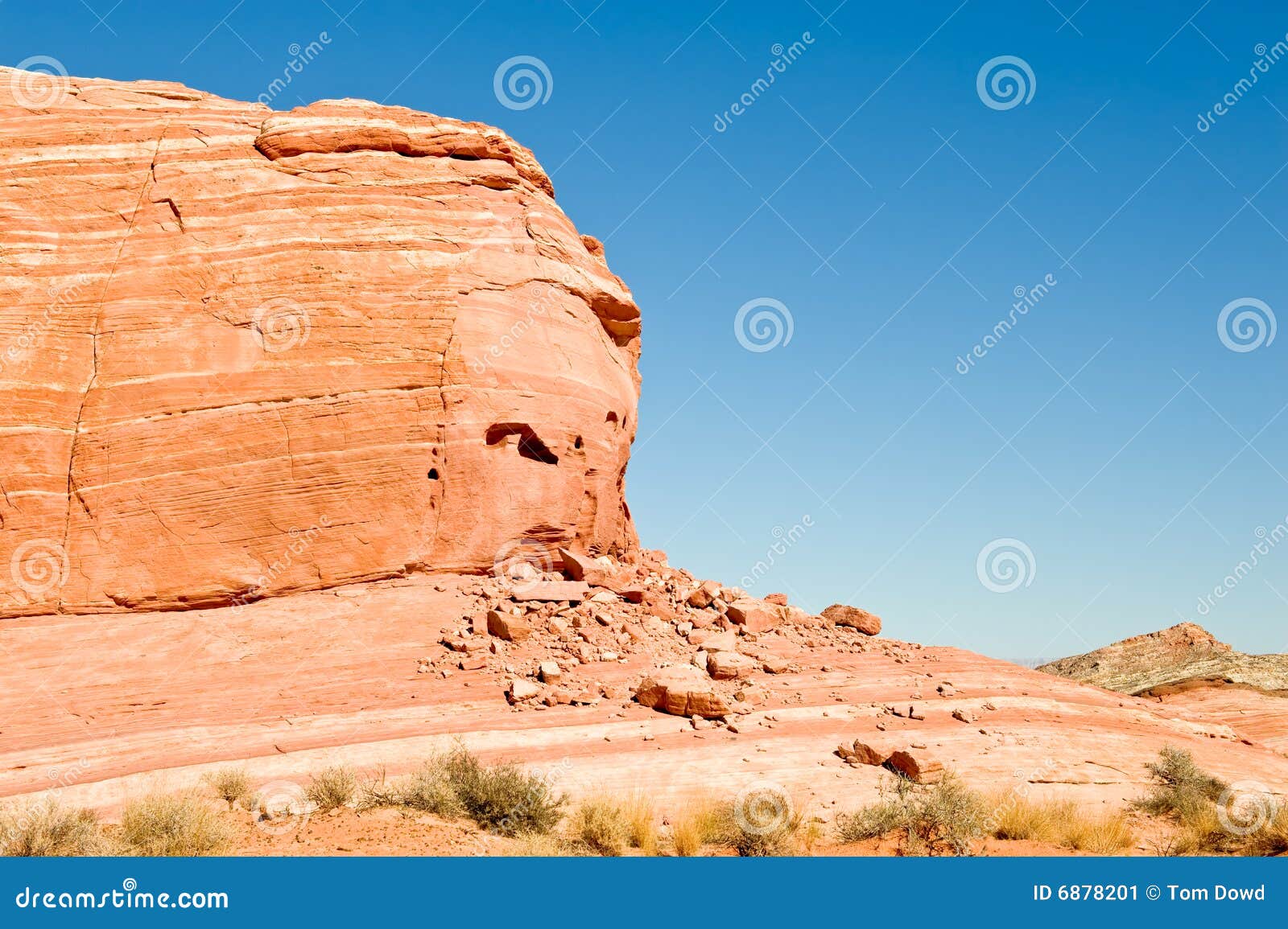 Sandstone cliff in desert stock image. Image of shrubs - 6878201