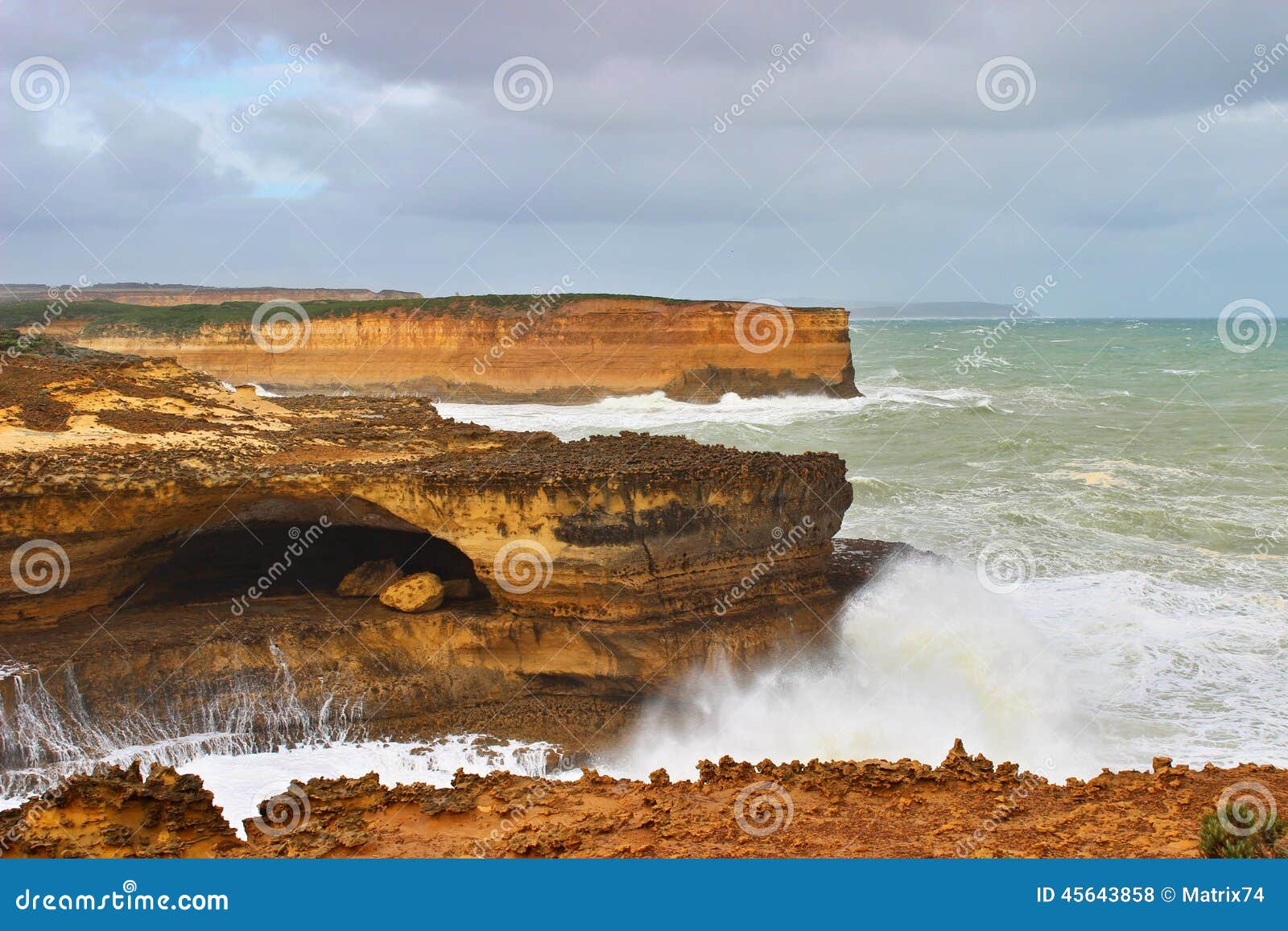 Sandstone Cliffs with Big Waves on Great Ocean Road Stock Photo - Image ...