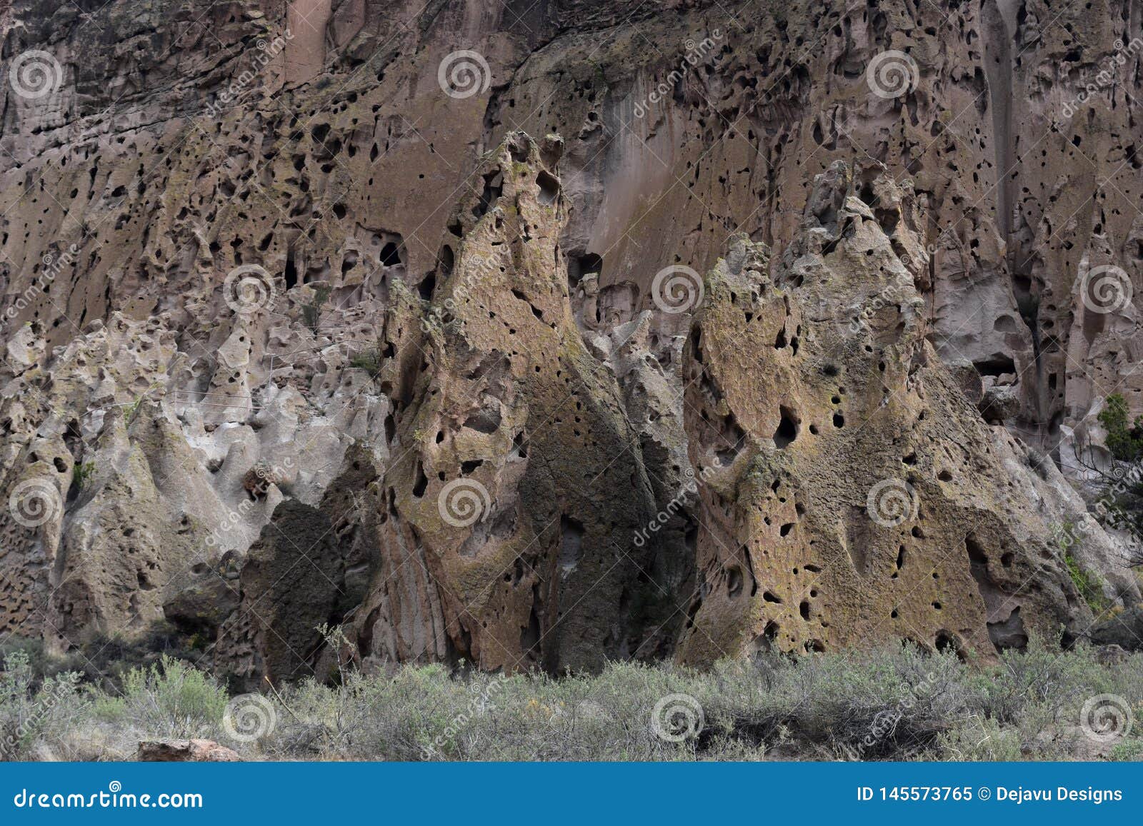 Sandstone Rock with Holes and Caverns Carved Out of the Stone Stock ...