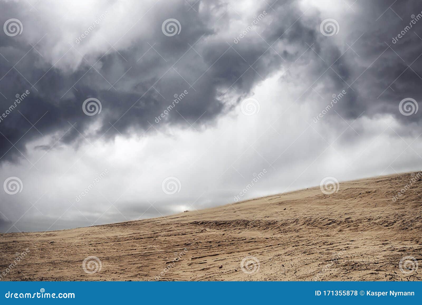 Sandstorm in a Dry Desert Under a Cloudy Sky Stock Photo - Image of ...