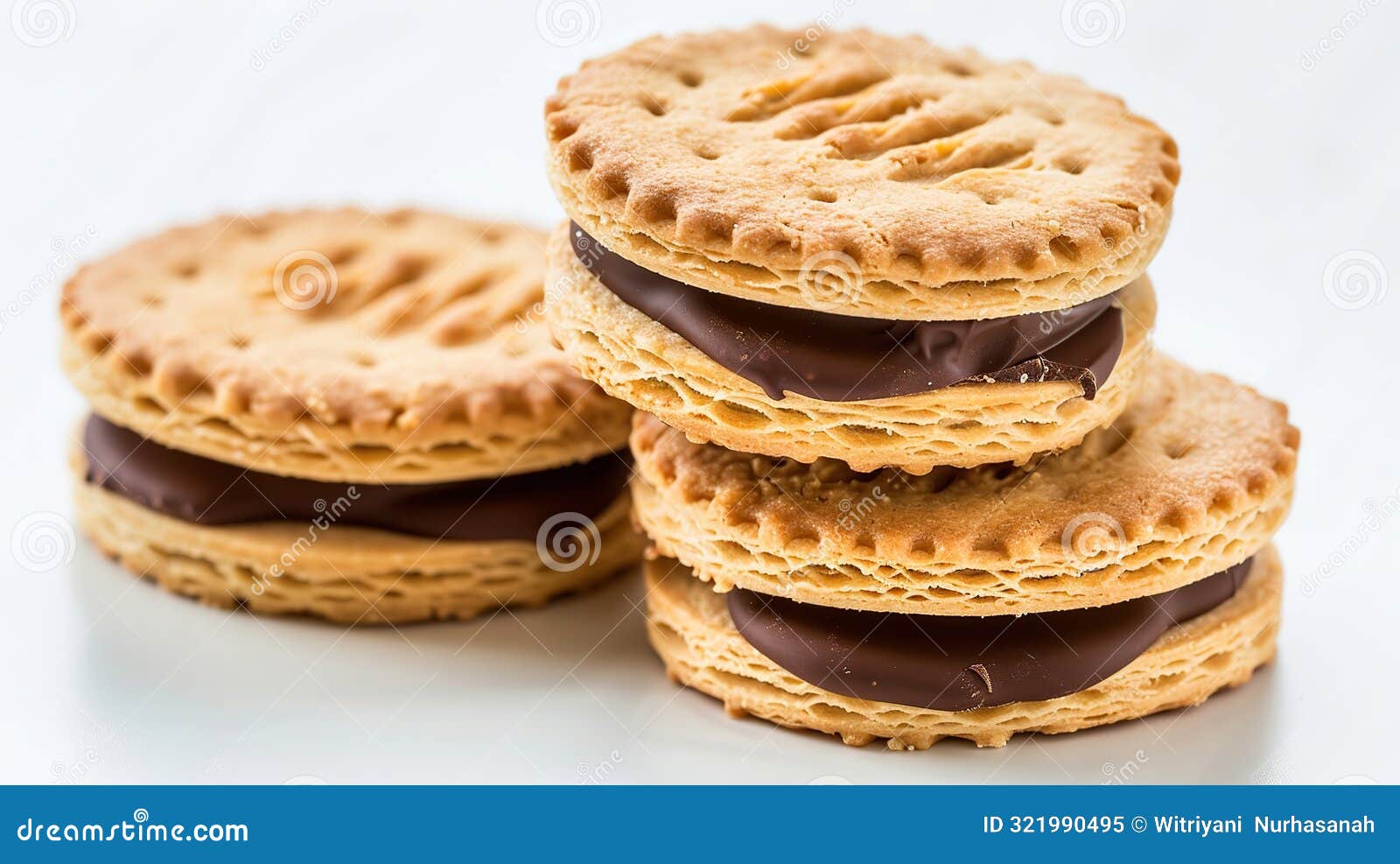Sandwich Biscuits with Chocolate Filling on a White Background ...