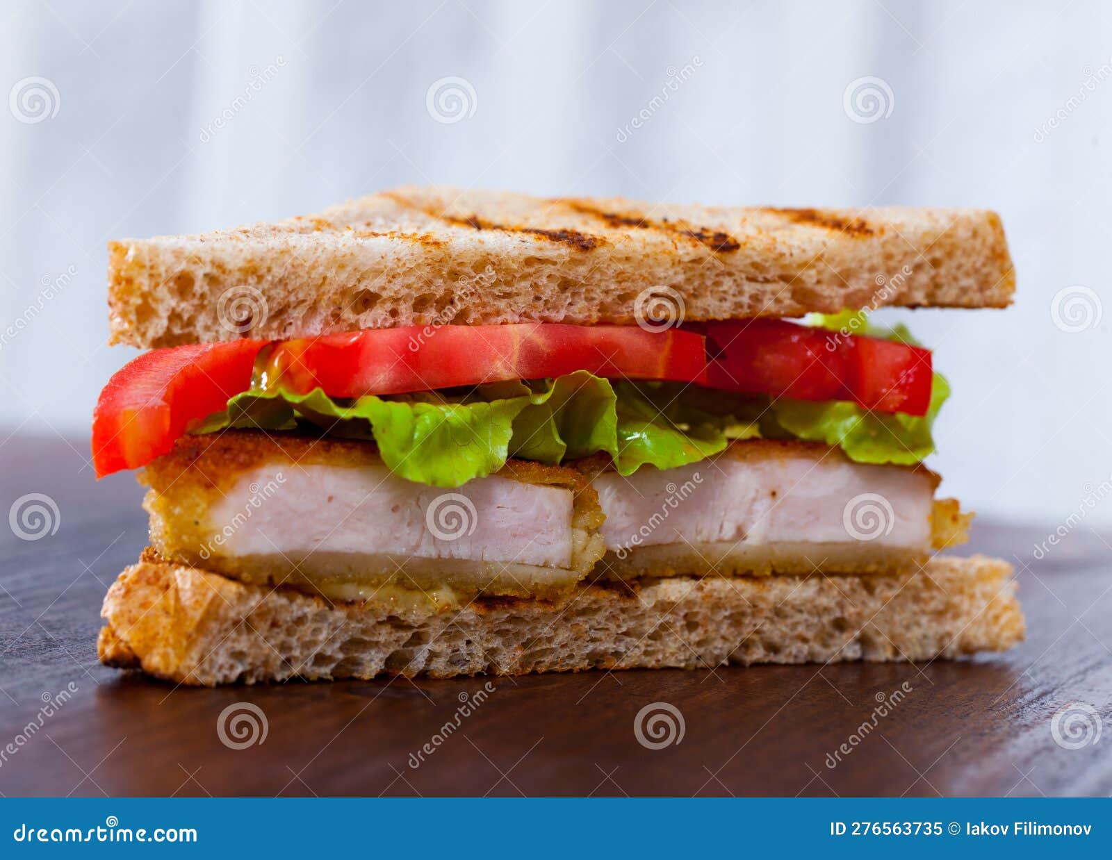 Sandwich with Bread, Chicken Nuggets, Tomatoes and Lettuce Stock Image ...