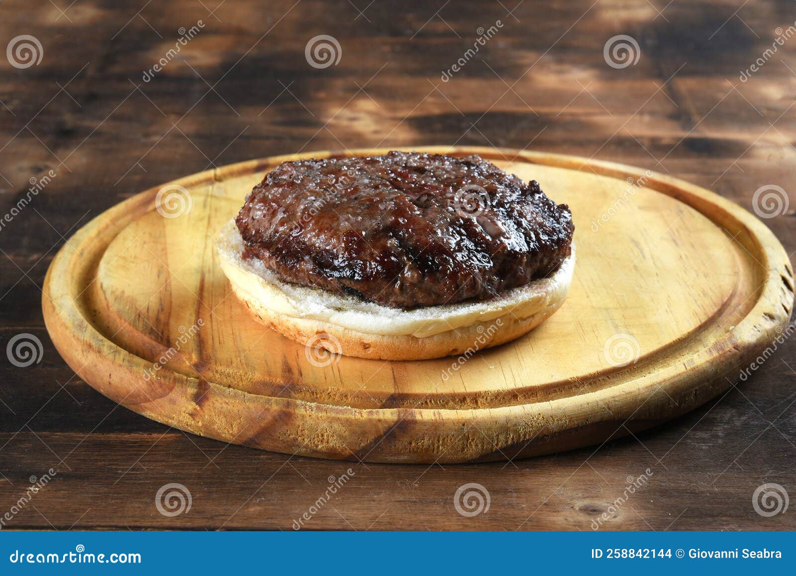 Sandwich Bread Cut in Half with Beef Burger on Top Stock Photo - Image ...