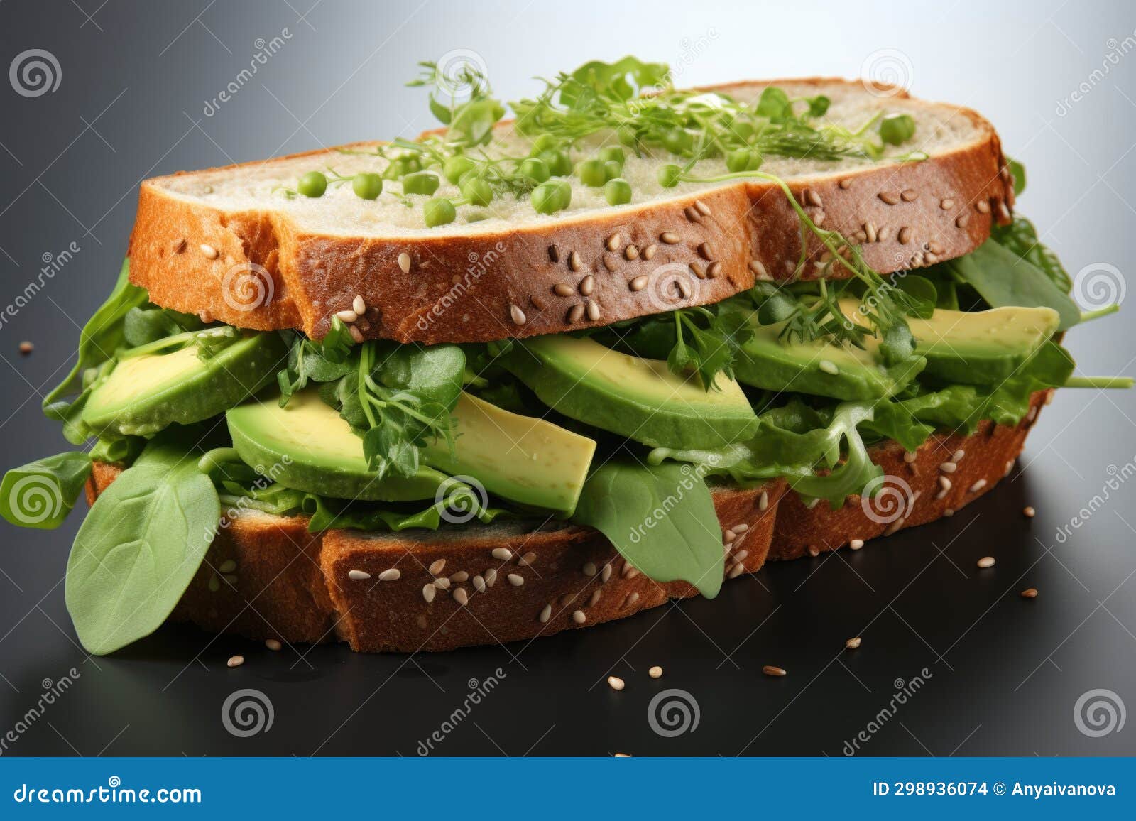 A Sandwich with Lettuce, Avocado and Sesame Seeds Stock Photo - Image ...