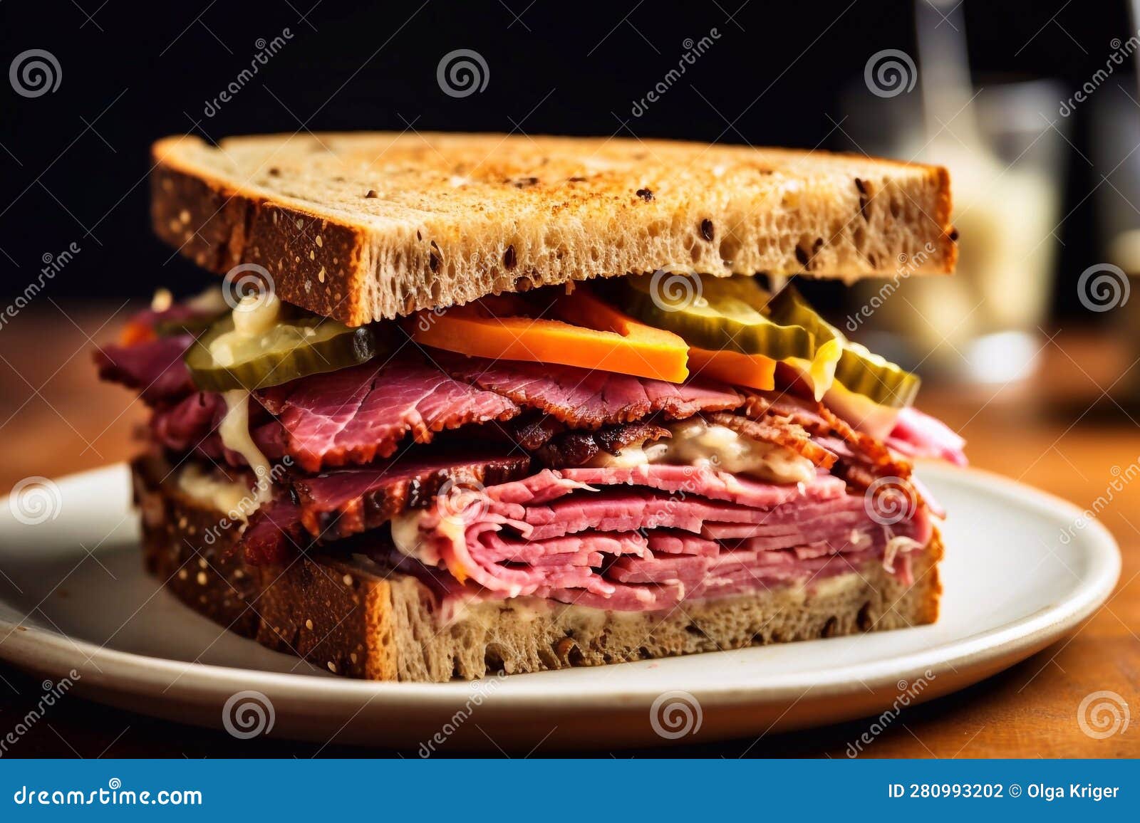Sandwich With Pastrami Pickles And Red Onions On Toasted Sourdough ...