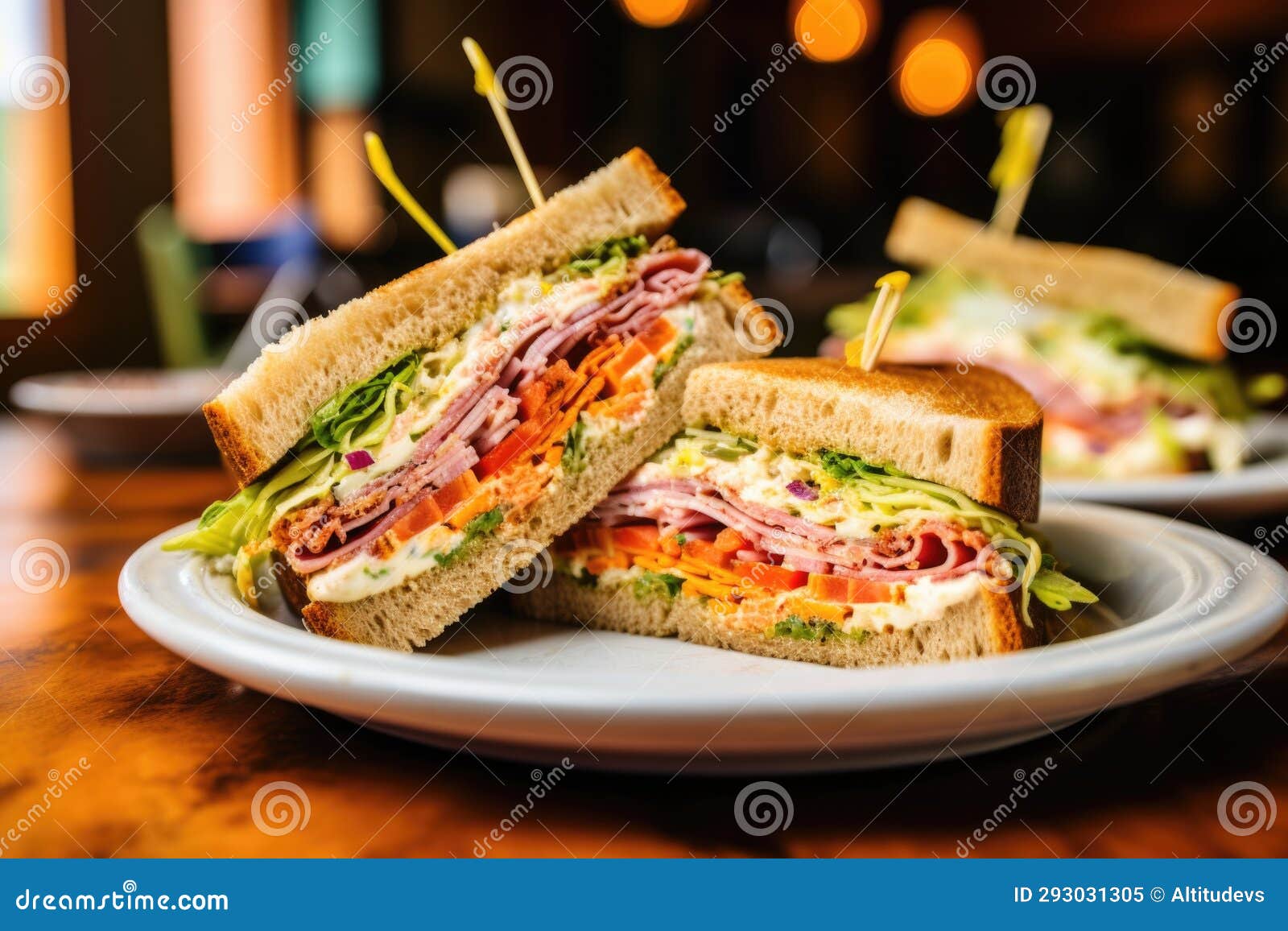 A Sandwich Split in Half, Each Side on a Different Plate Stock Image ...