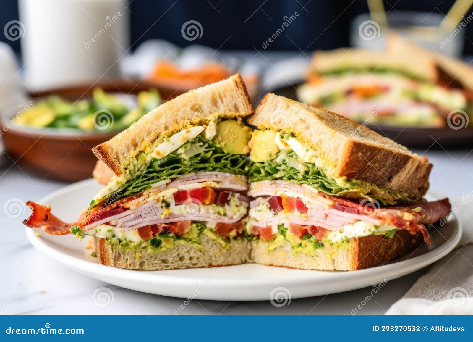A Sandwich Split in Half, Each Side on a Different Plate Stock Photo ...
