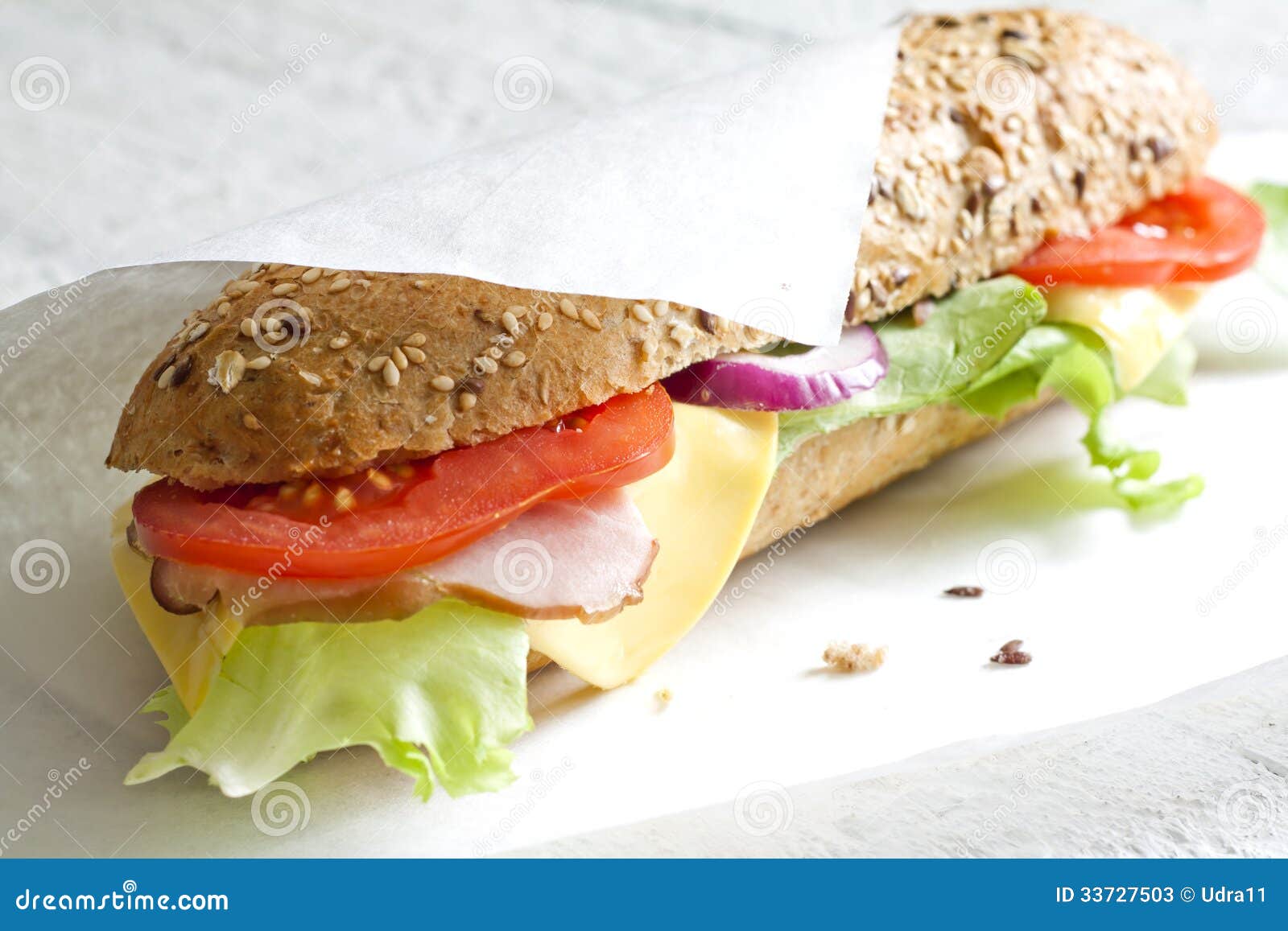 Sandwich on white paper stock image. Image of natural - 33727503