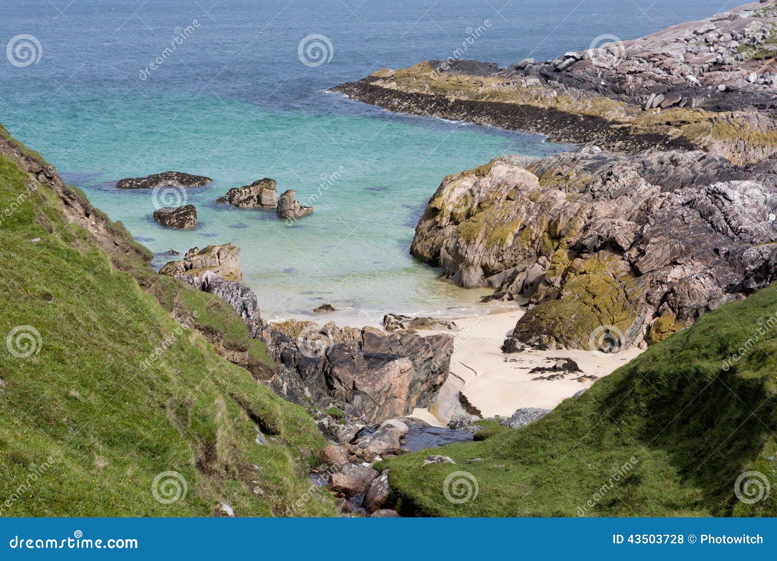 Sandy bay on rocky beach stock photo. Image of seascape - 43503728