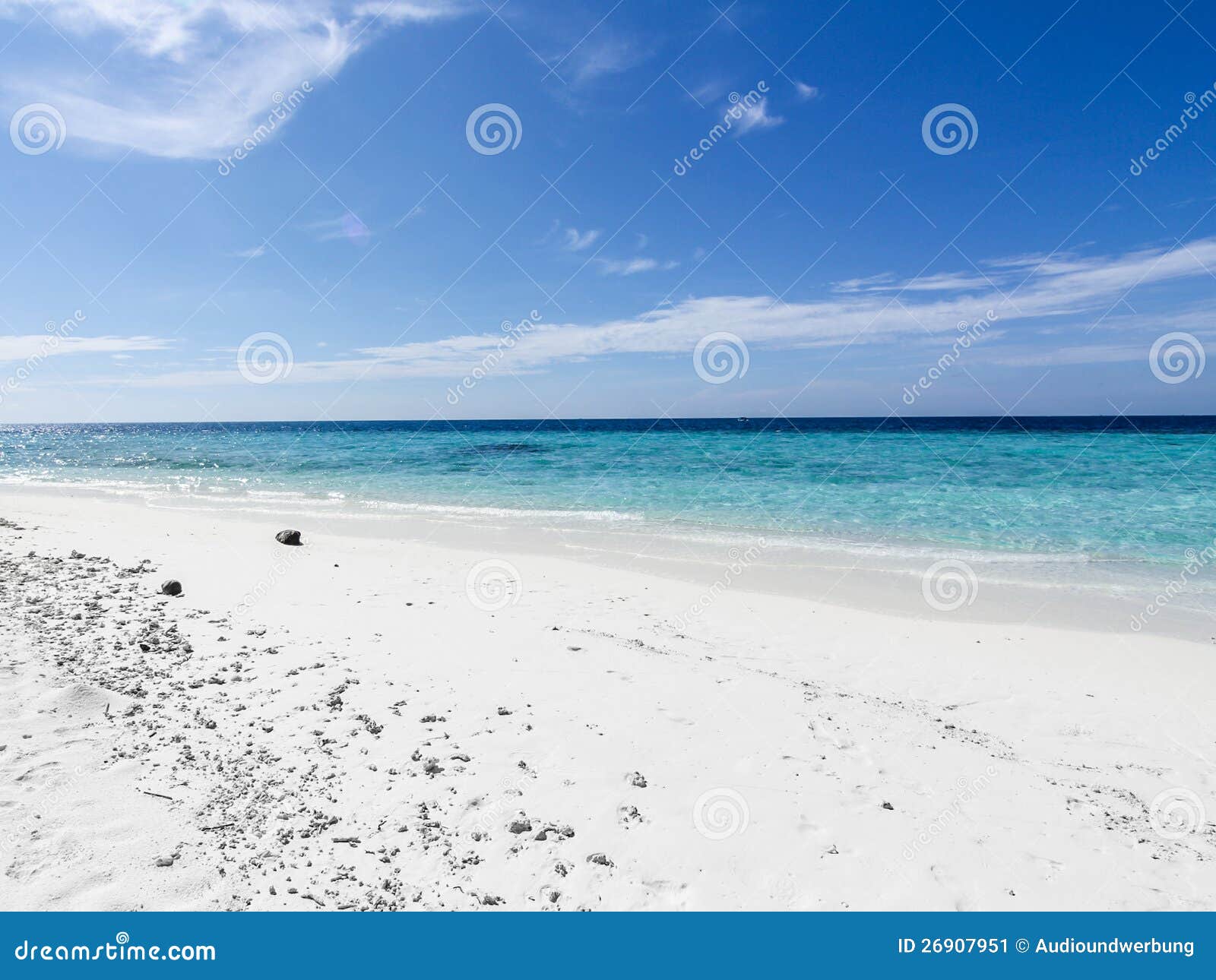 Sandy beach and blue skies stock image. Image of beach - 26907951