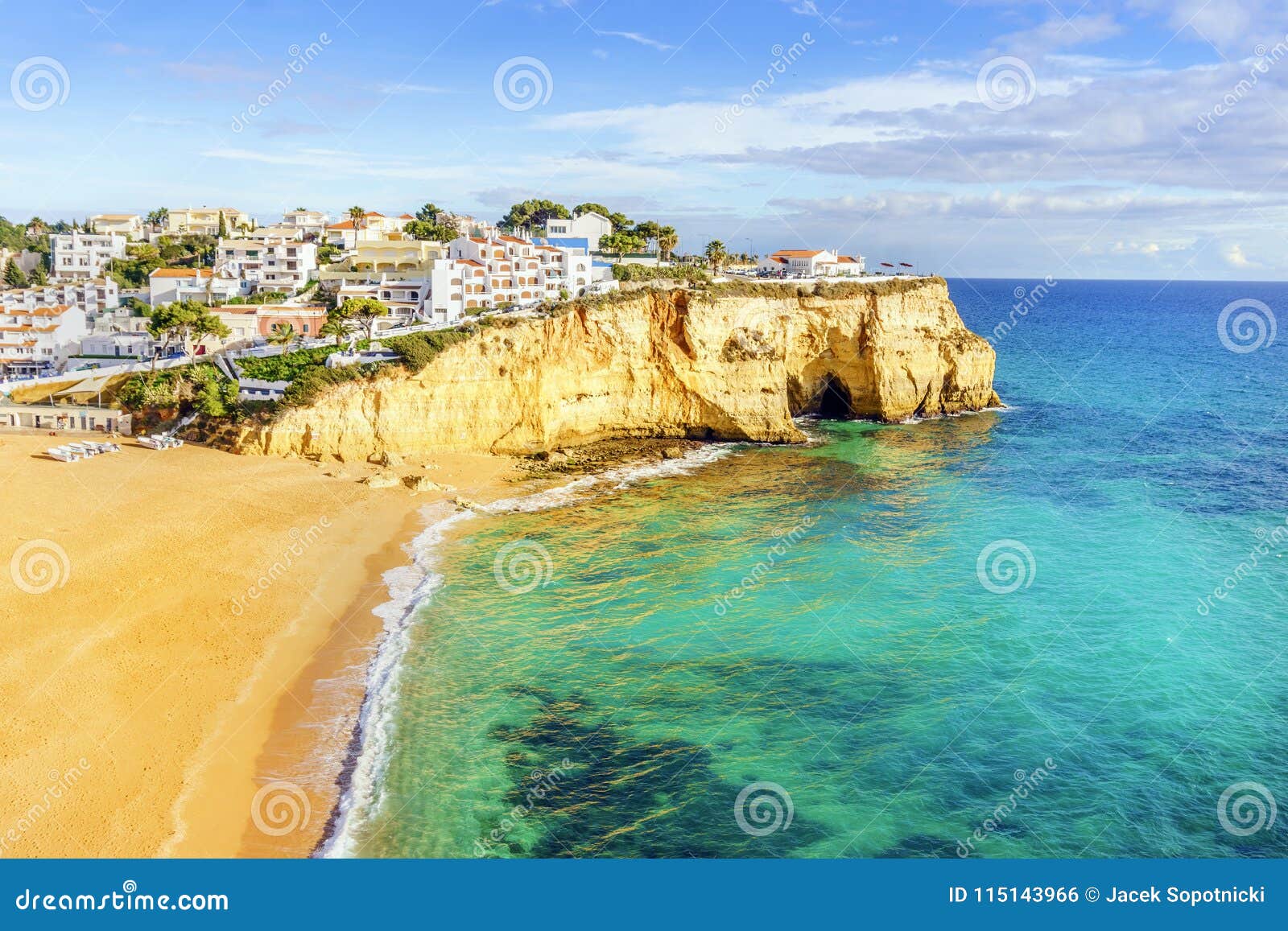 Sandy Beach between Cliffs in Front of White Architecture of Car Stock ...