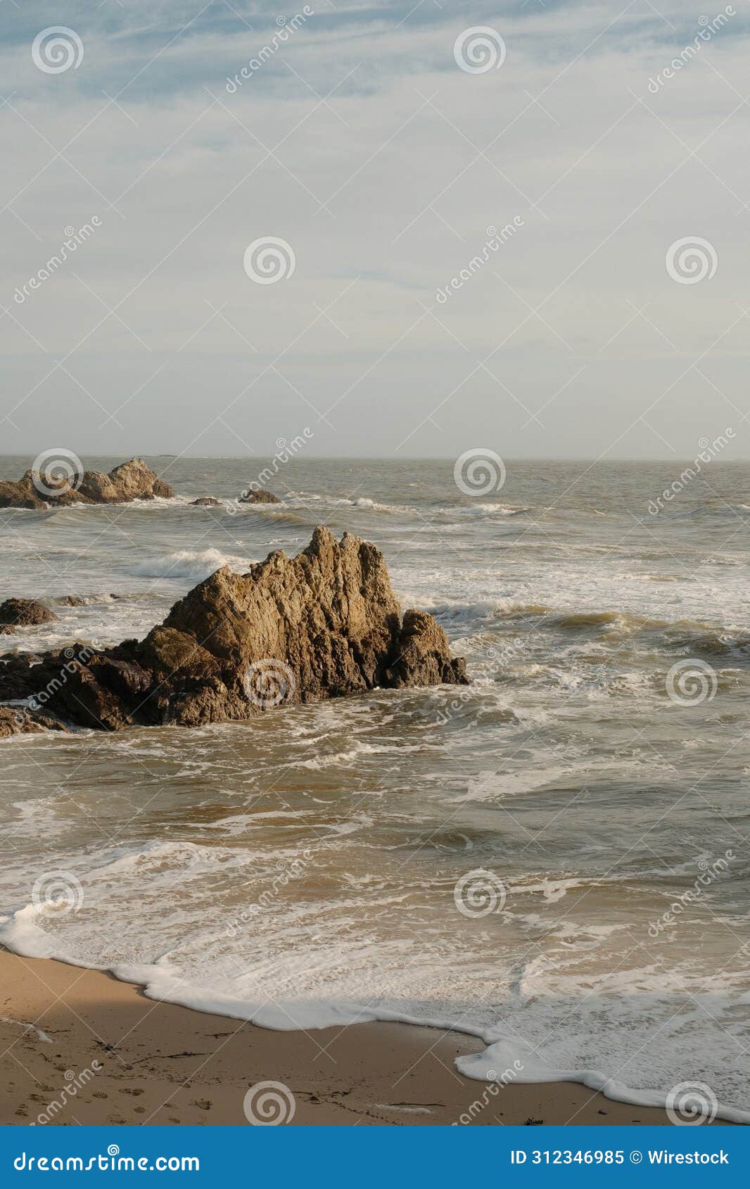 Sandy Beach with Coastal Rocks in the Water Stock Image - Image of ...