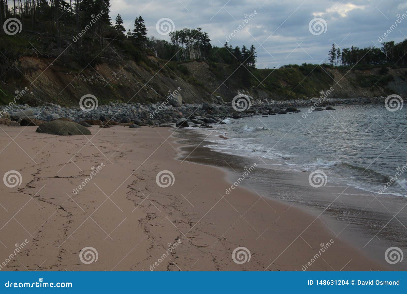 A Sandy Beach Leading To a Rocky Beach Stock Photo - Image of water ...