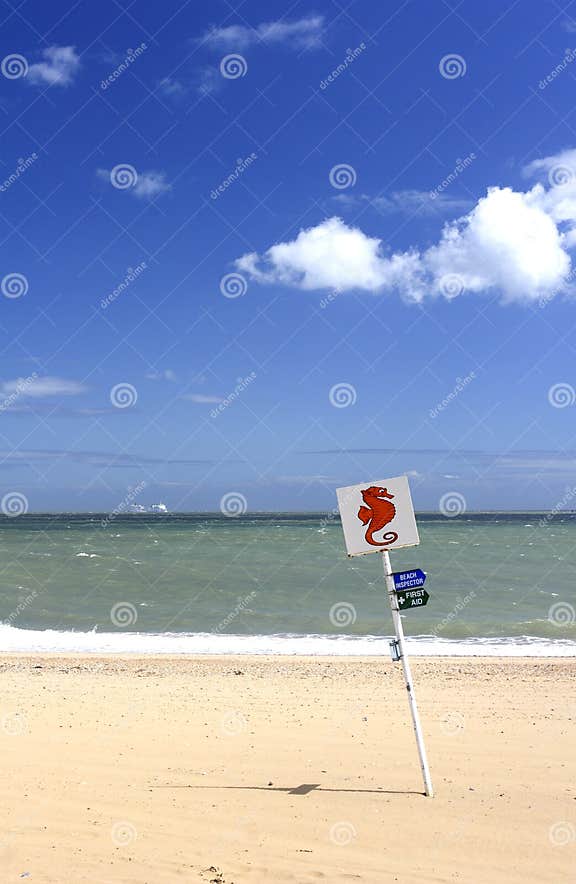 Sandy beach and sign stock image. Image of sign, british - 873273