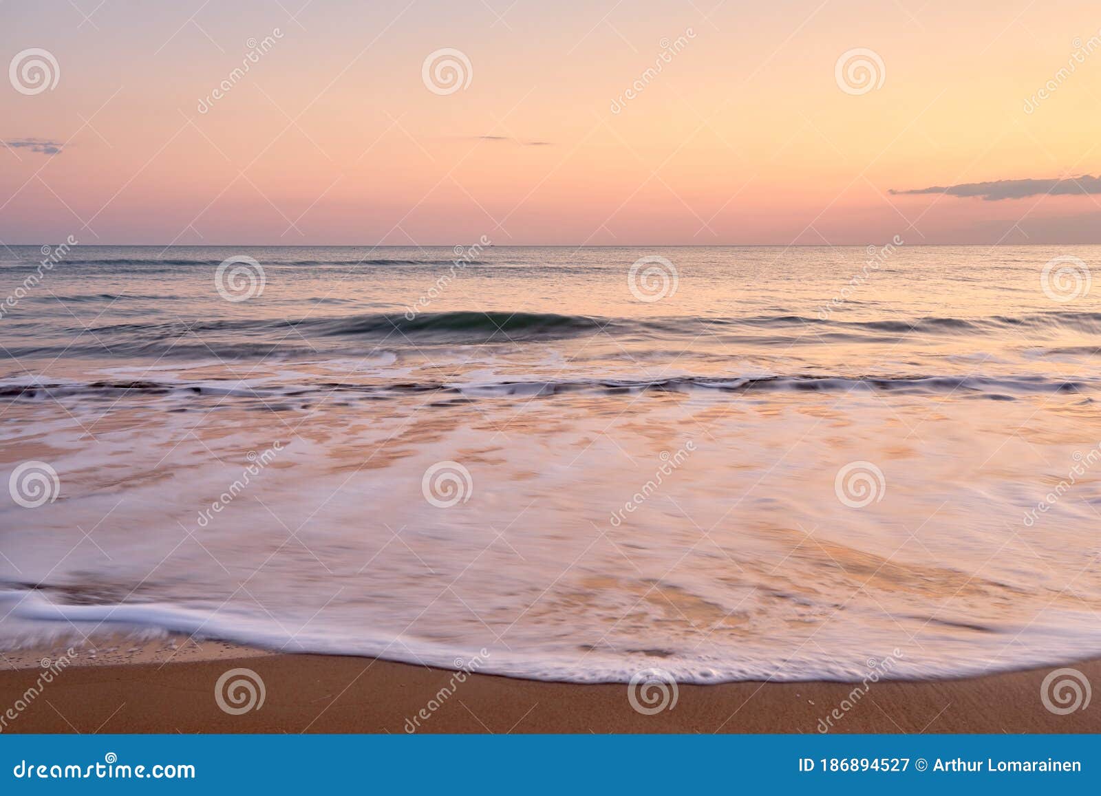 Sandy Beach on a Sunset with Reflection on Wet Sand and Waves with Foam ...