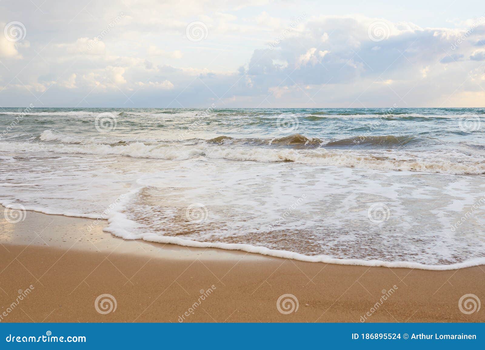 Sandy Beach on a Sunset with Reflection on Wet Sand and Waves with Foam ...