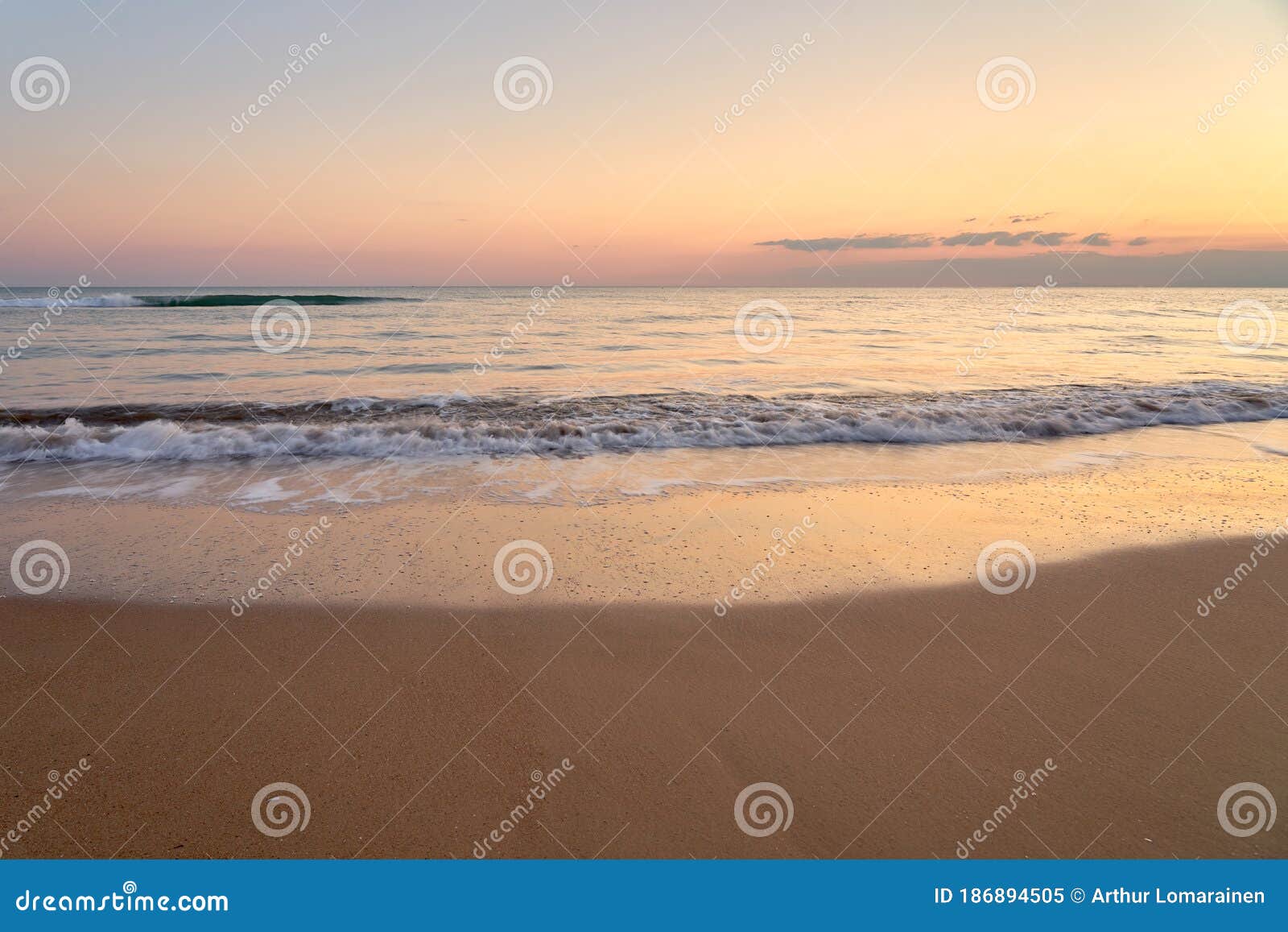 Sandy Beach on a Sunset with Reflection on Wet Sand and Waves with Foam ...