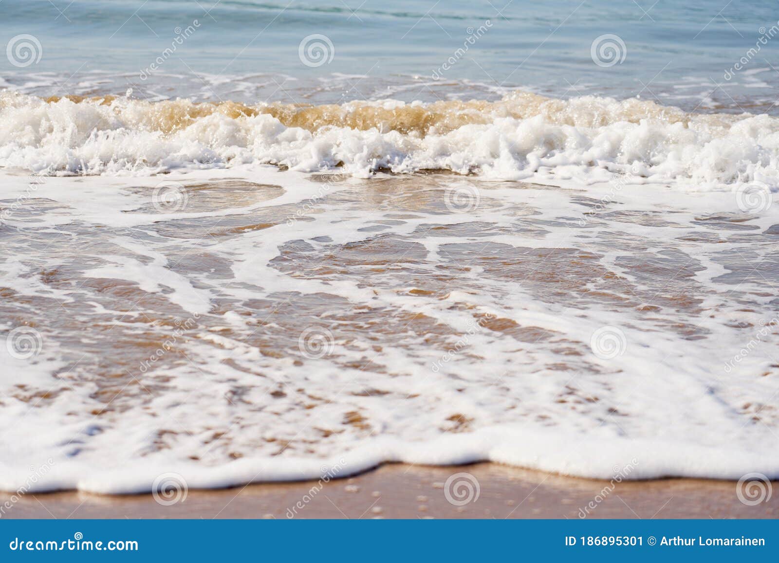 Sandy Beach on a Sunset with Reflection on Wet Sand and Waves with Foam ...