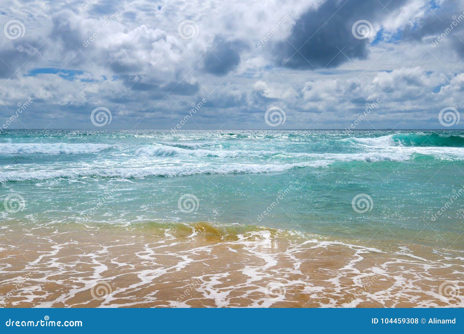 The Sandy Beach of the Tropical Ocean and the Overcast Sky. Stock Photo ...