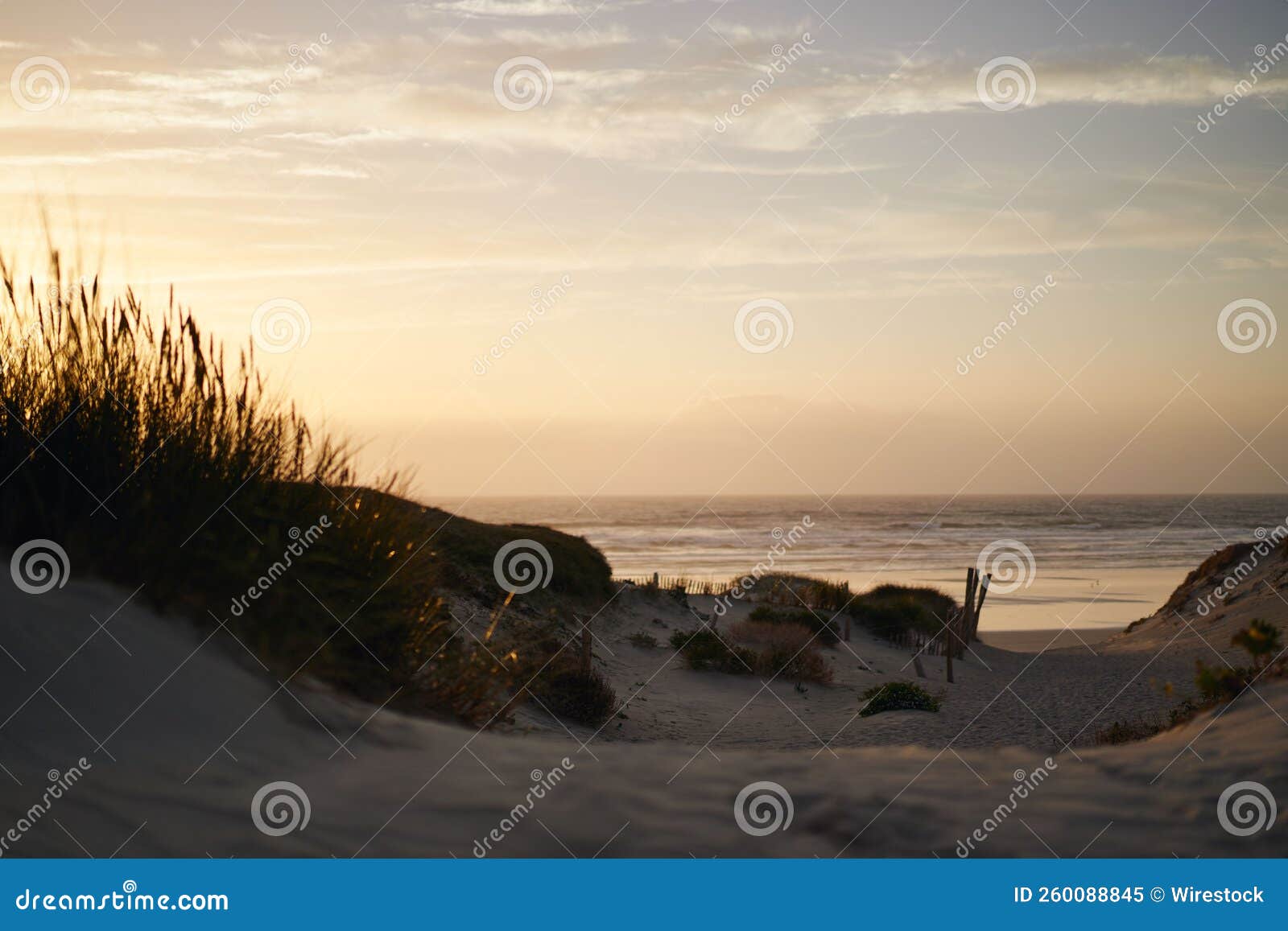 Sandy Beach View at Sunset with the Seascape in the Background Stock ...