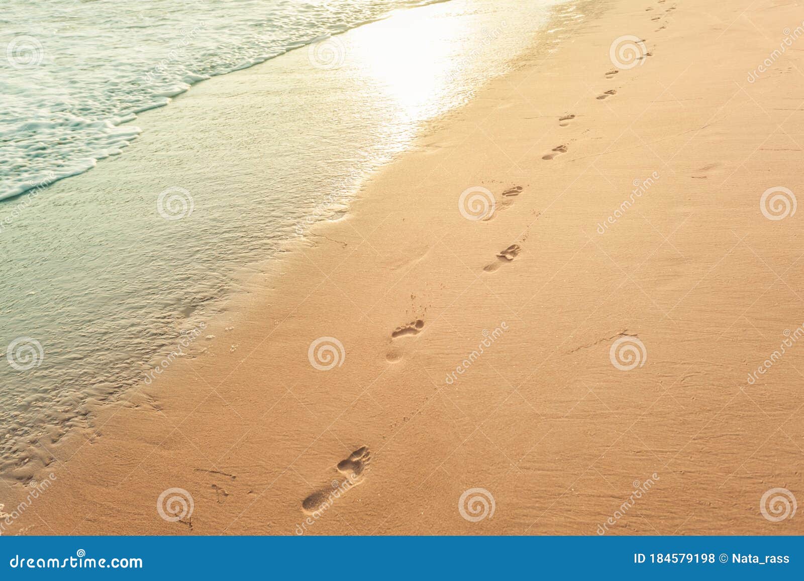 Sandy Beach with Wave and Steps in Sunset Light Stock Photo - Image of ...