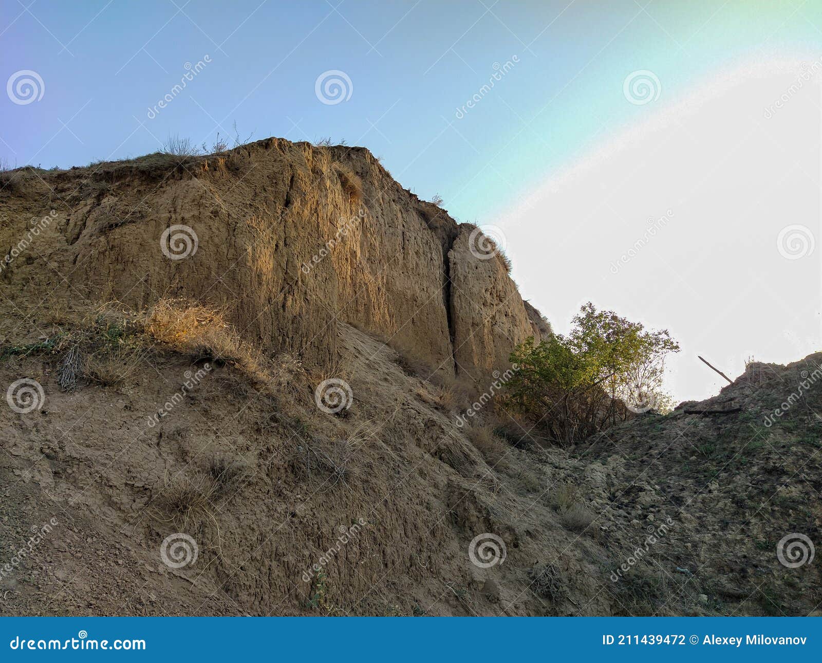 Sandy Crumbling Mountain with Nests of Swallows Stock Photo - Image of ...