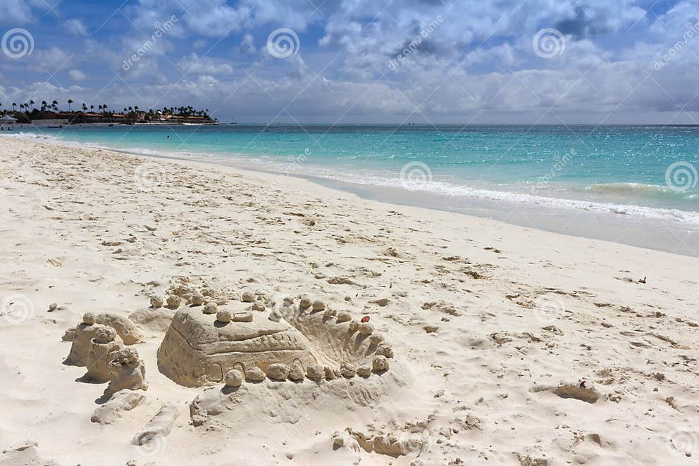 Sandy Figure on Aruba Beach Stock Photo - Image of travel, beach: 132855104
