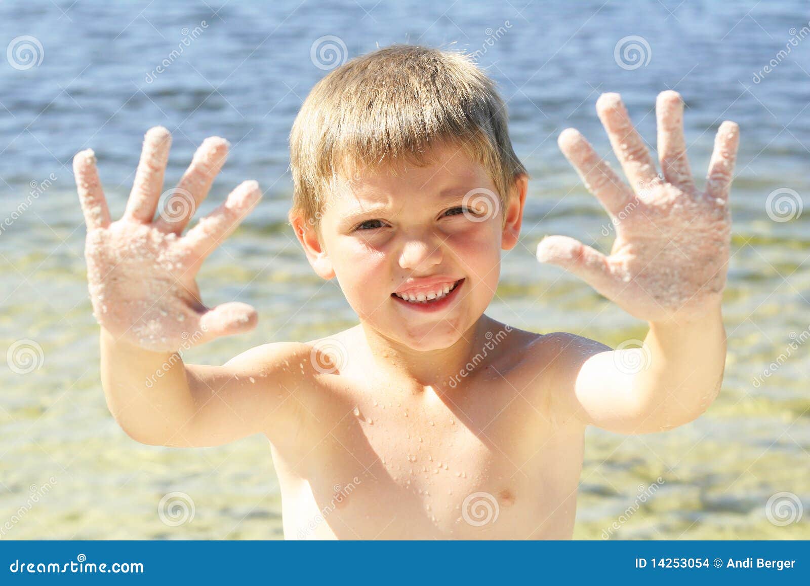 Sandy hands framing face stock photo. Image of relax - 14253054