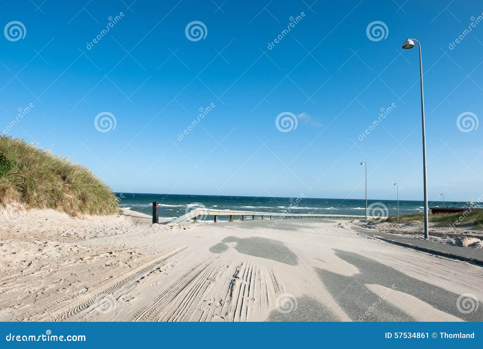 Sandy road stock image. Image of wind, brown, coast, water - 57534861