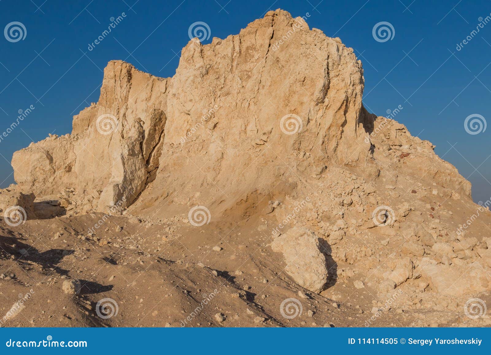 Sandy rock in the desert stock image. Image of scene - 114114505