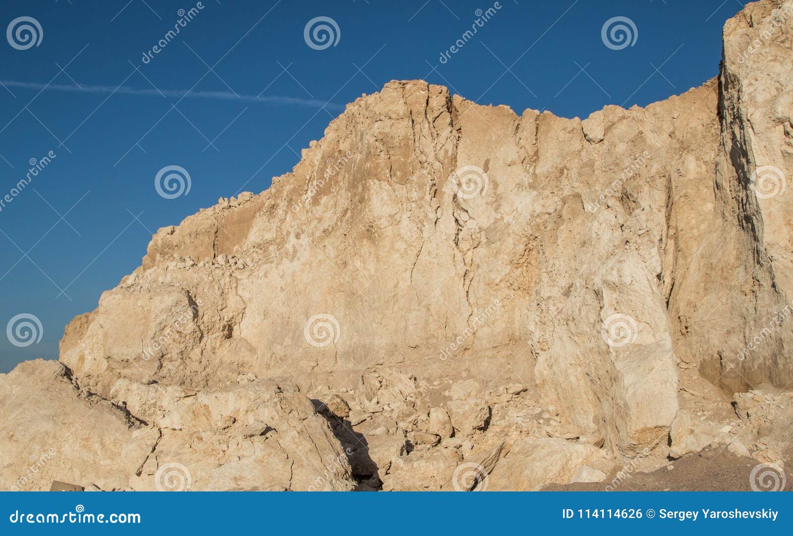 Sandy rock in the desert stock photo. Image of dunes - 114114626