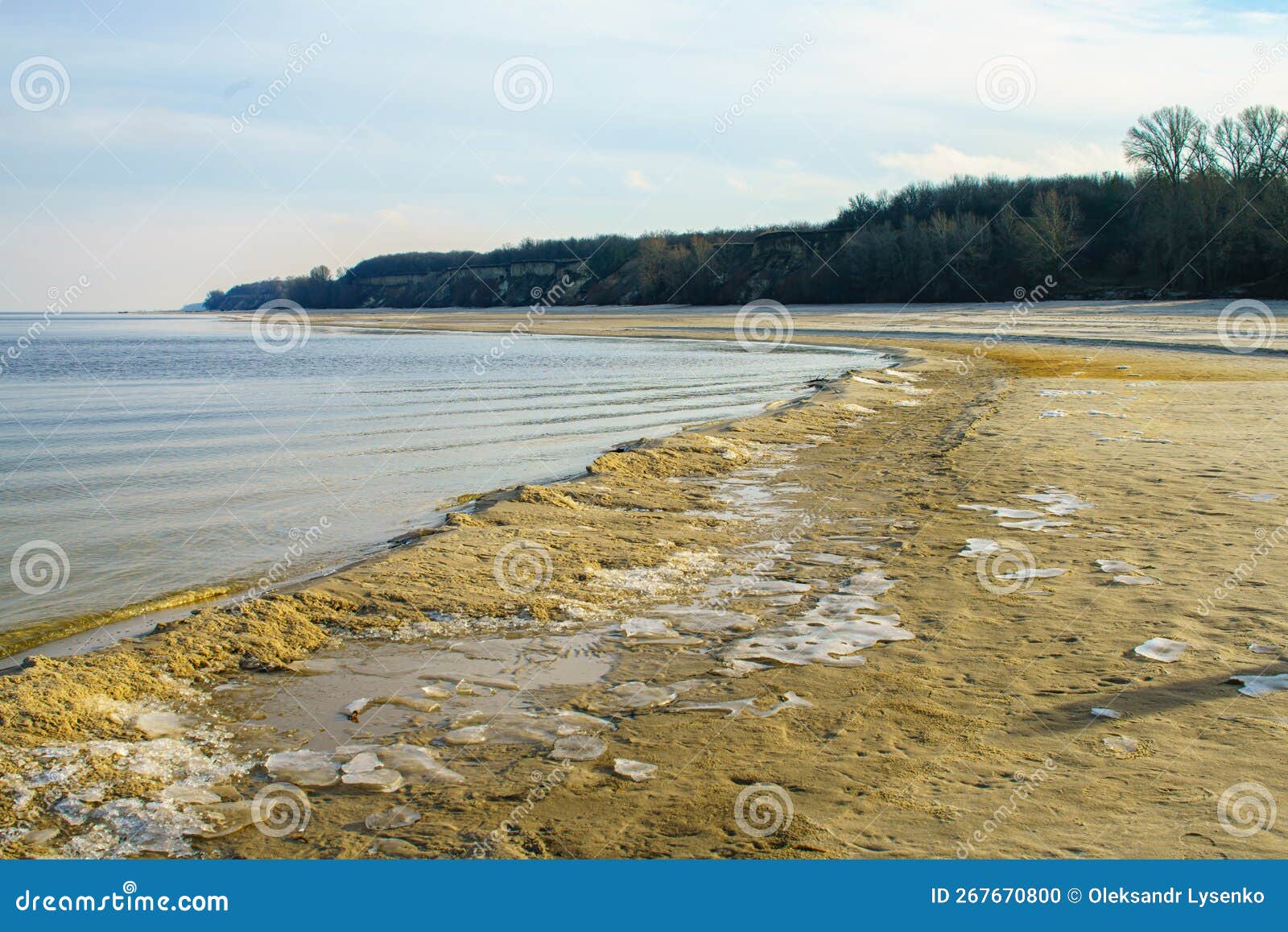 Sandy Shore with Ice and Water. View of the Winter Beach Stock Photo ...