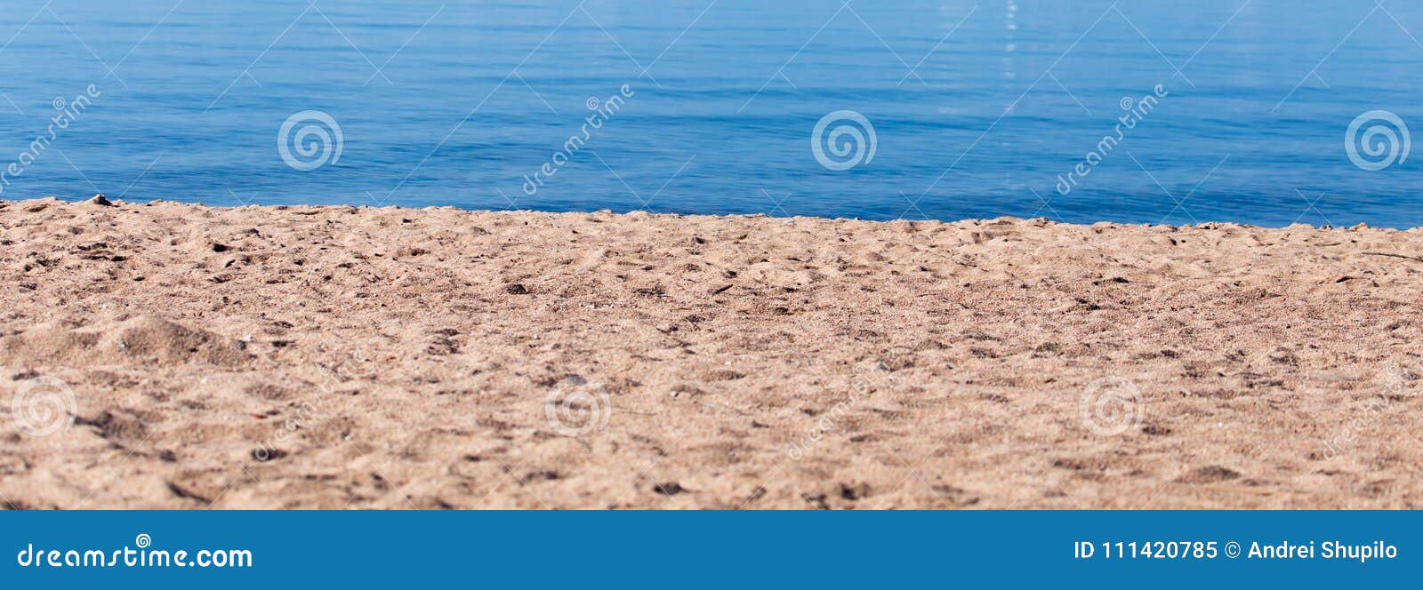 Sandy Shore of the Sea As a Backdrop Stock Image - Image of water, sand ...