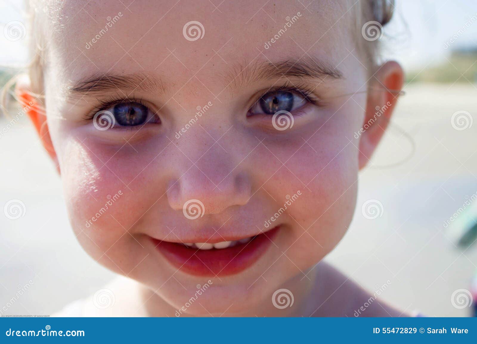 Sandy Smiles stock image. Image of summer, smiles, girl - 55472829