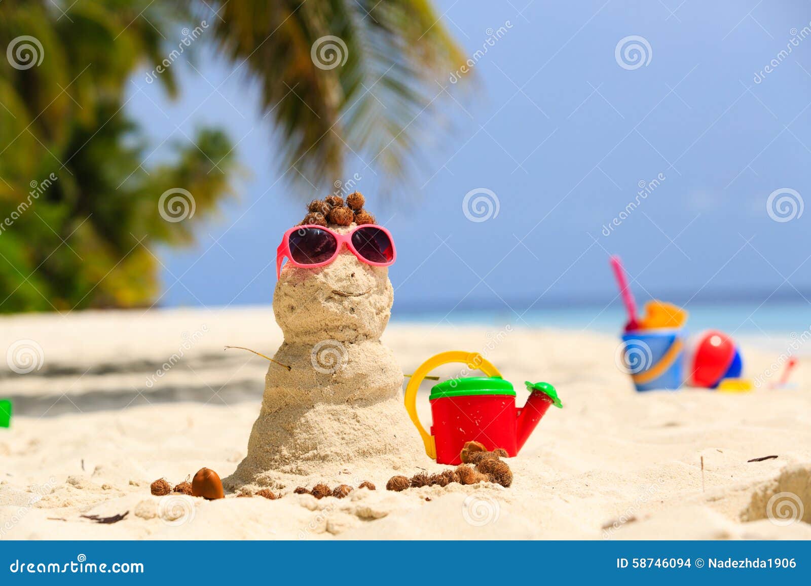 Sandy Snowman and Toys at Sand Beach Stock Photo - Image of summer ...