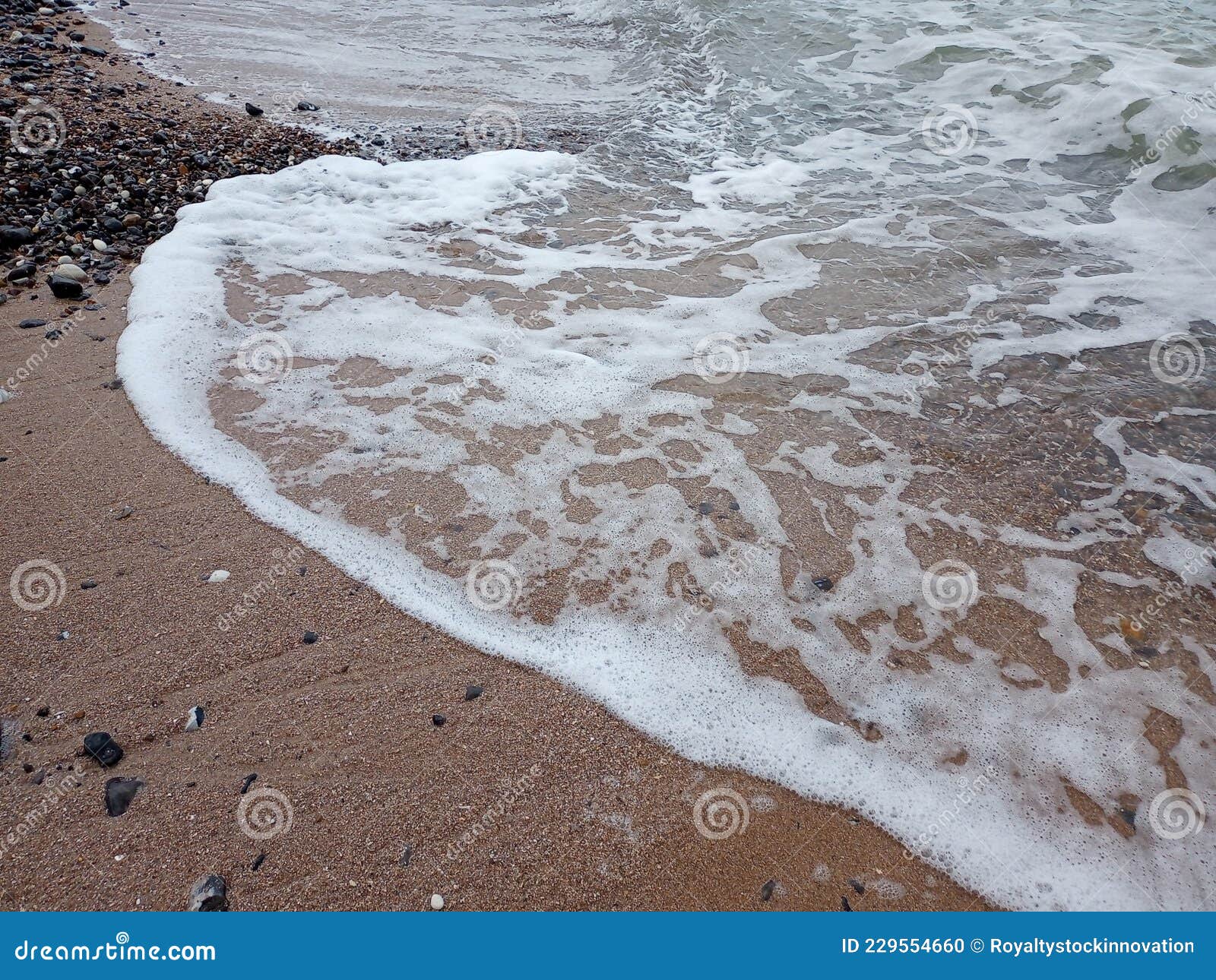 Sandy Stone Beach Sea Water Close Up Stock Photo - Image of winter ...