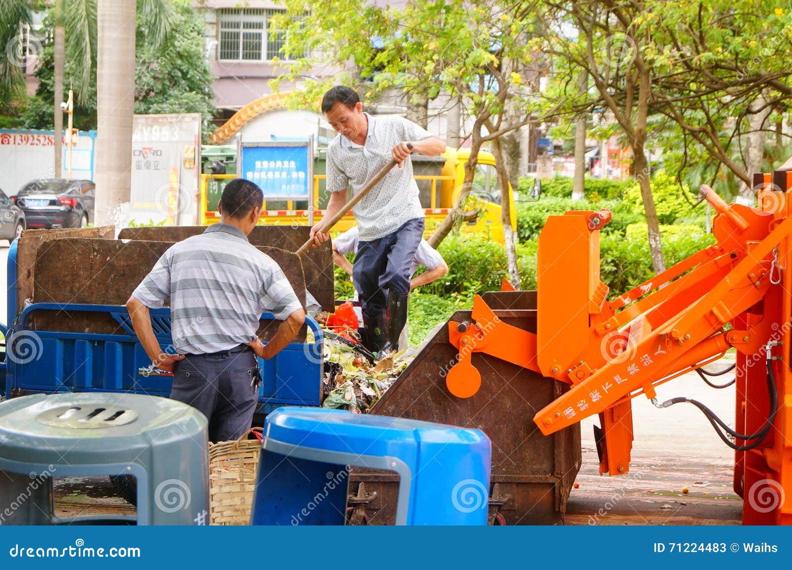 Sanitation Workers Loading and Unloading Garbage Editorial Stock Photo ...
