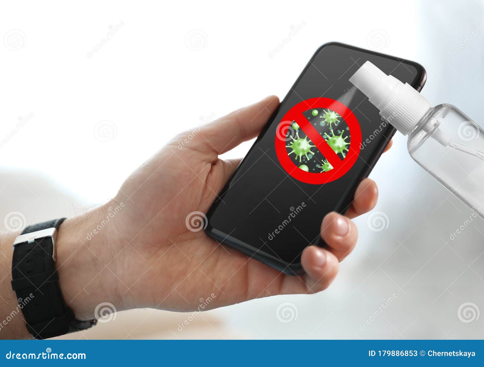 Sanitizing Mobile Devices during Coronavirus. Antiseptic Spray and Man ...
