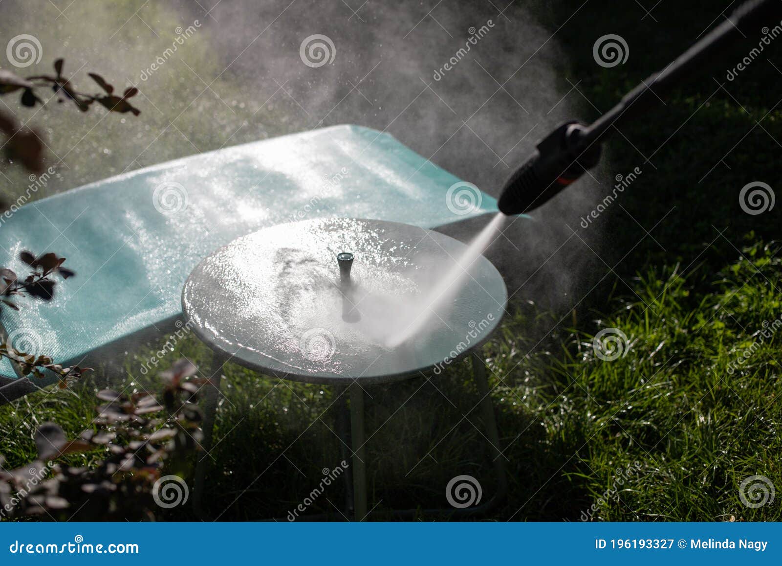 Sanitizing Table With Alcohol Disinfectant Spray Bottle In Restaurant ...