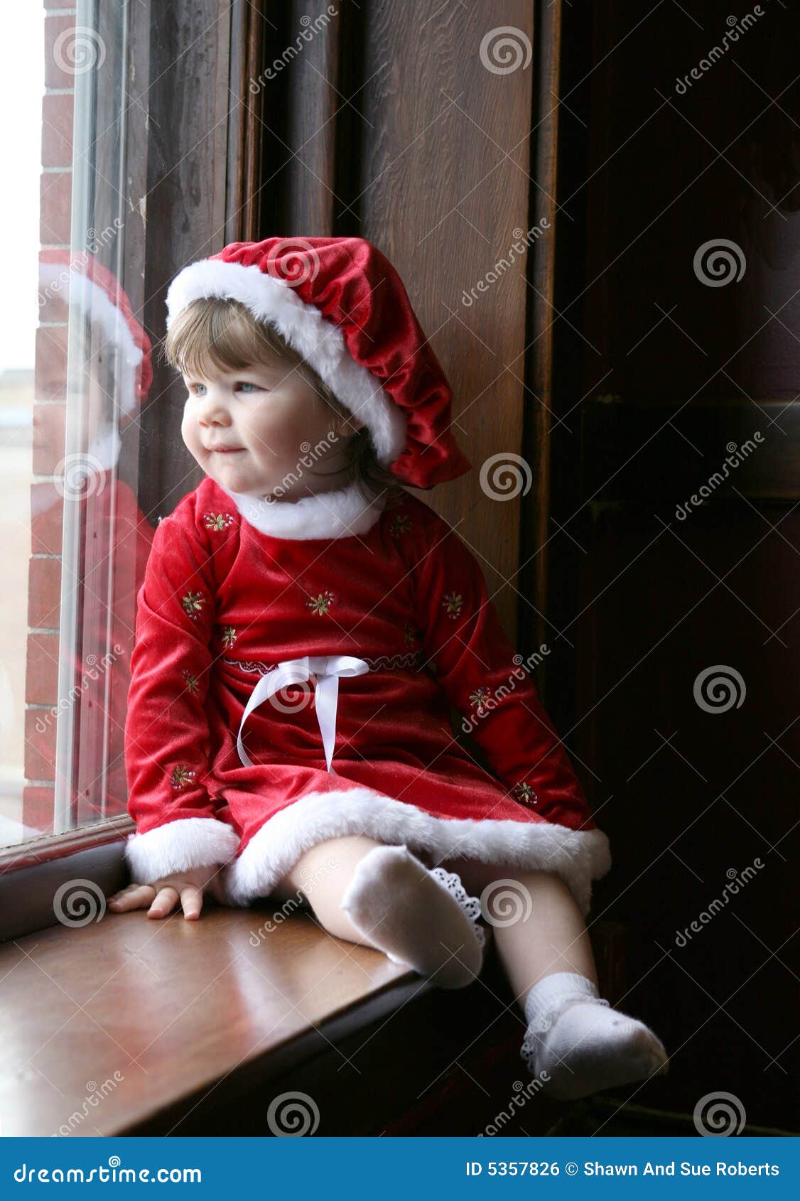 Santa Baby at Window stock photo. Image of dream, gaze - 5357826
