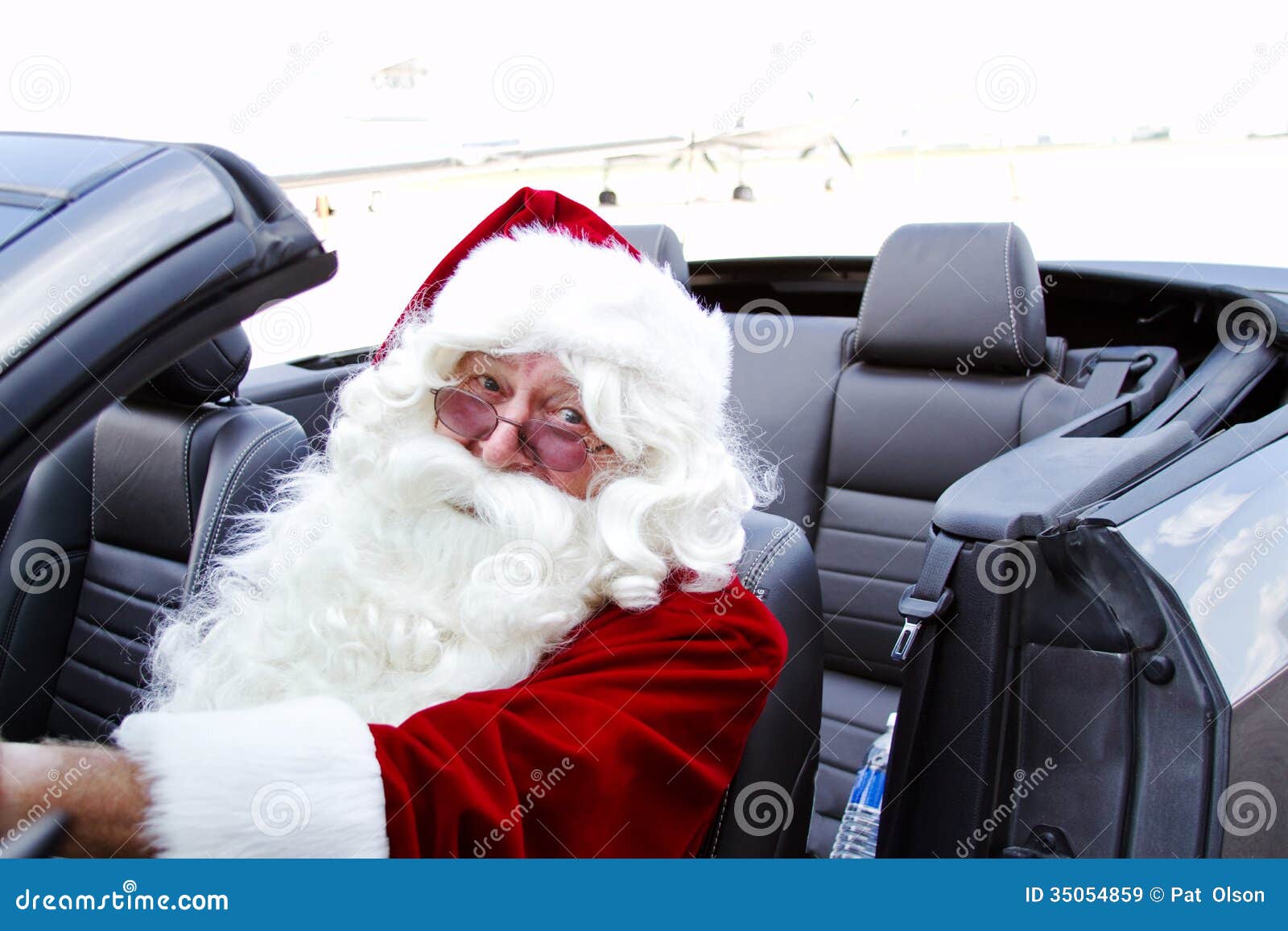 Santa in blue convertible stock image. Image of suit - 35054859
