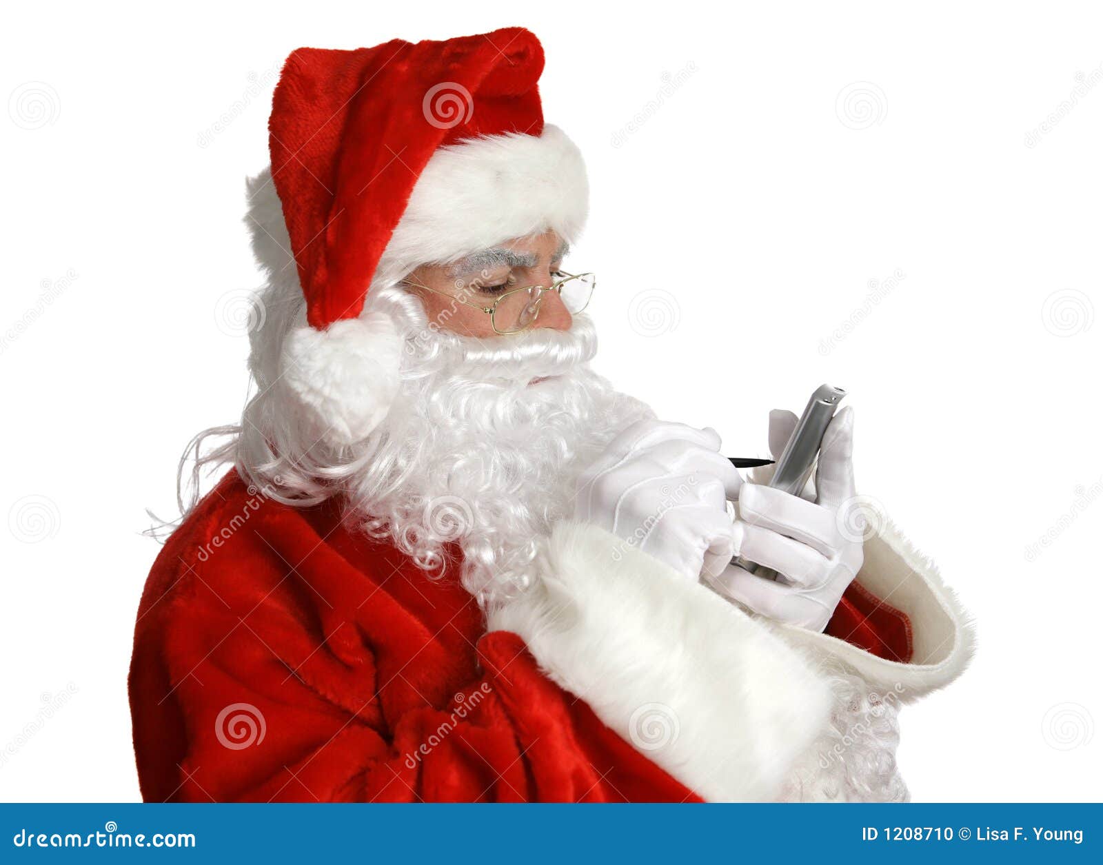 Santa Checks List on PDA stock photo. Image of modern - 1208710