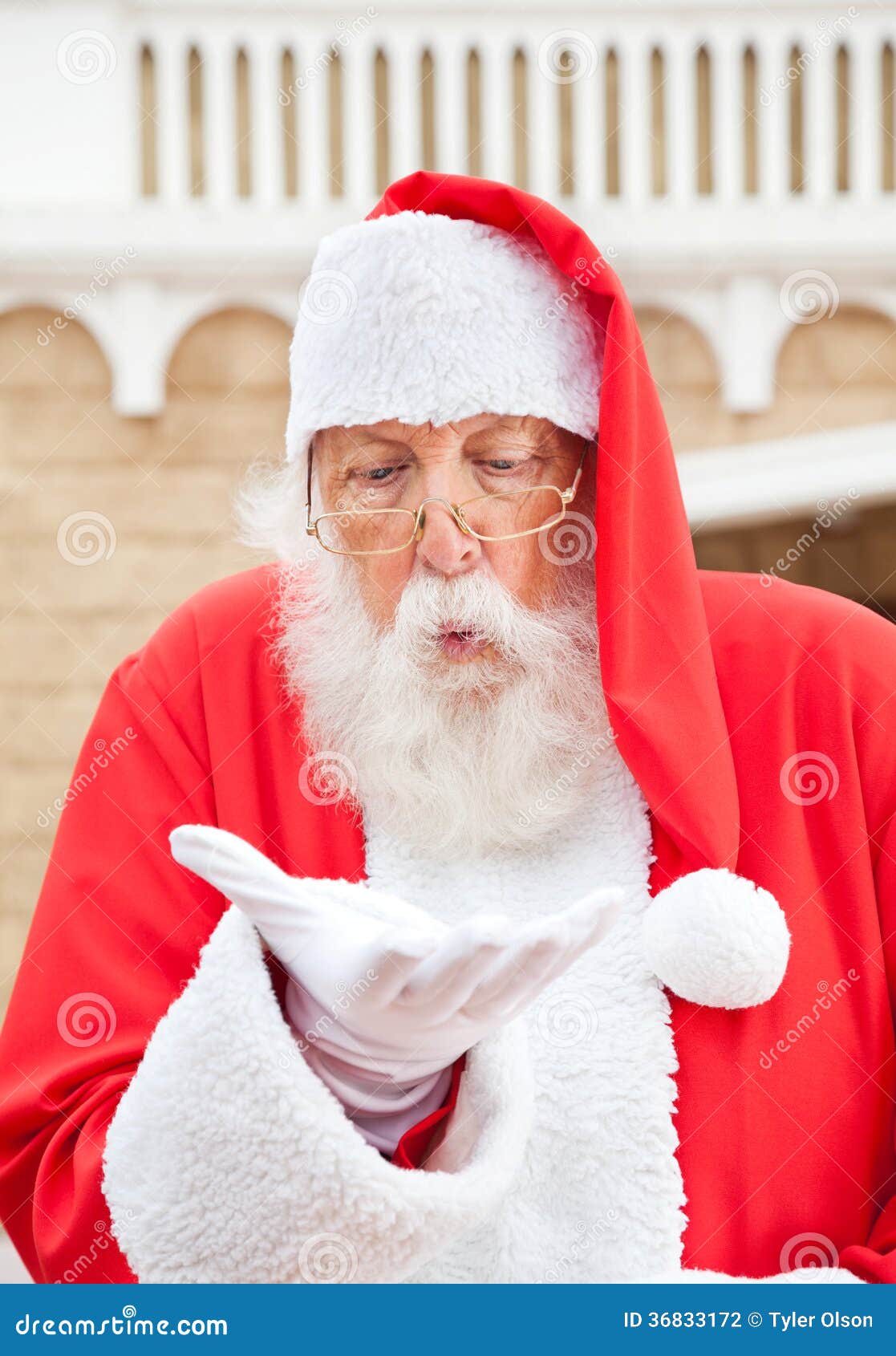 Santa Claus Blowing in Palm Stock Photo - Image of father, portrait ...