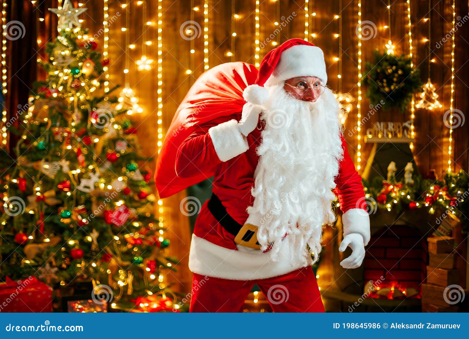 Santa Claus Carrying Presents in His Sack Stock Photo - Image of ...