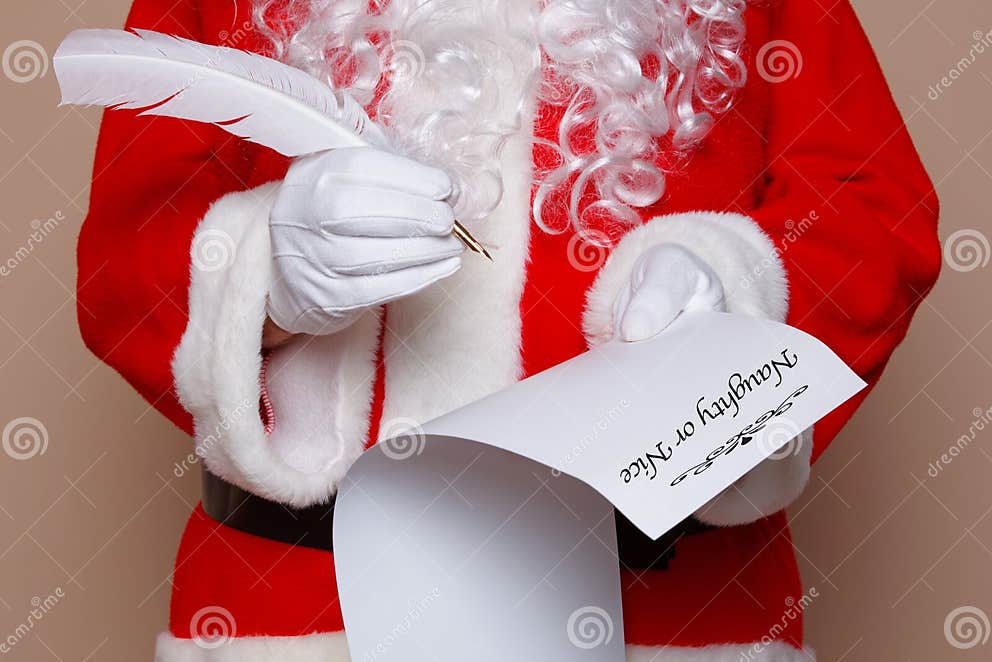 Santa Claus Checking His List Stock Image - Image of nice, holding ...
