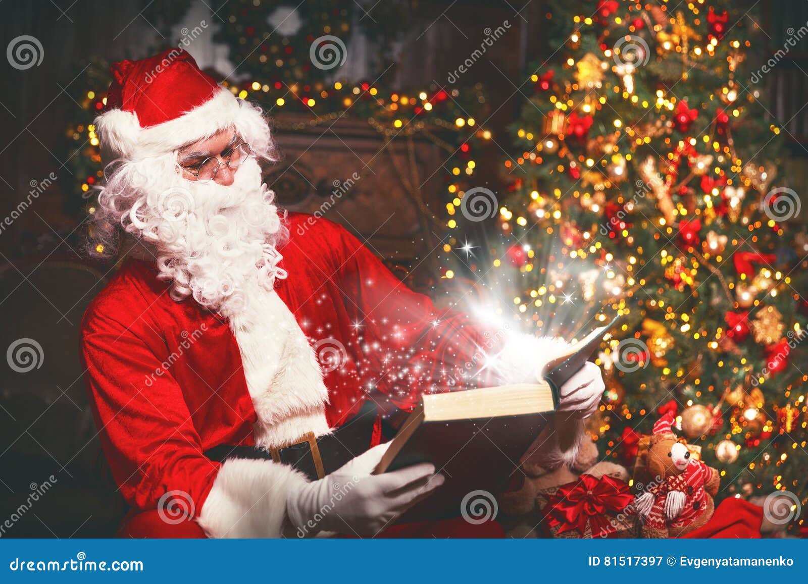 Santa Claus at Christmas with Magical Book Stock Image - Image of ...