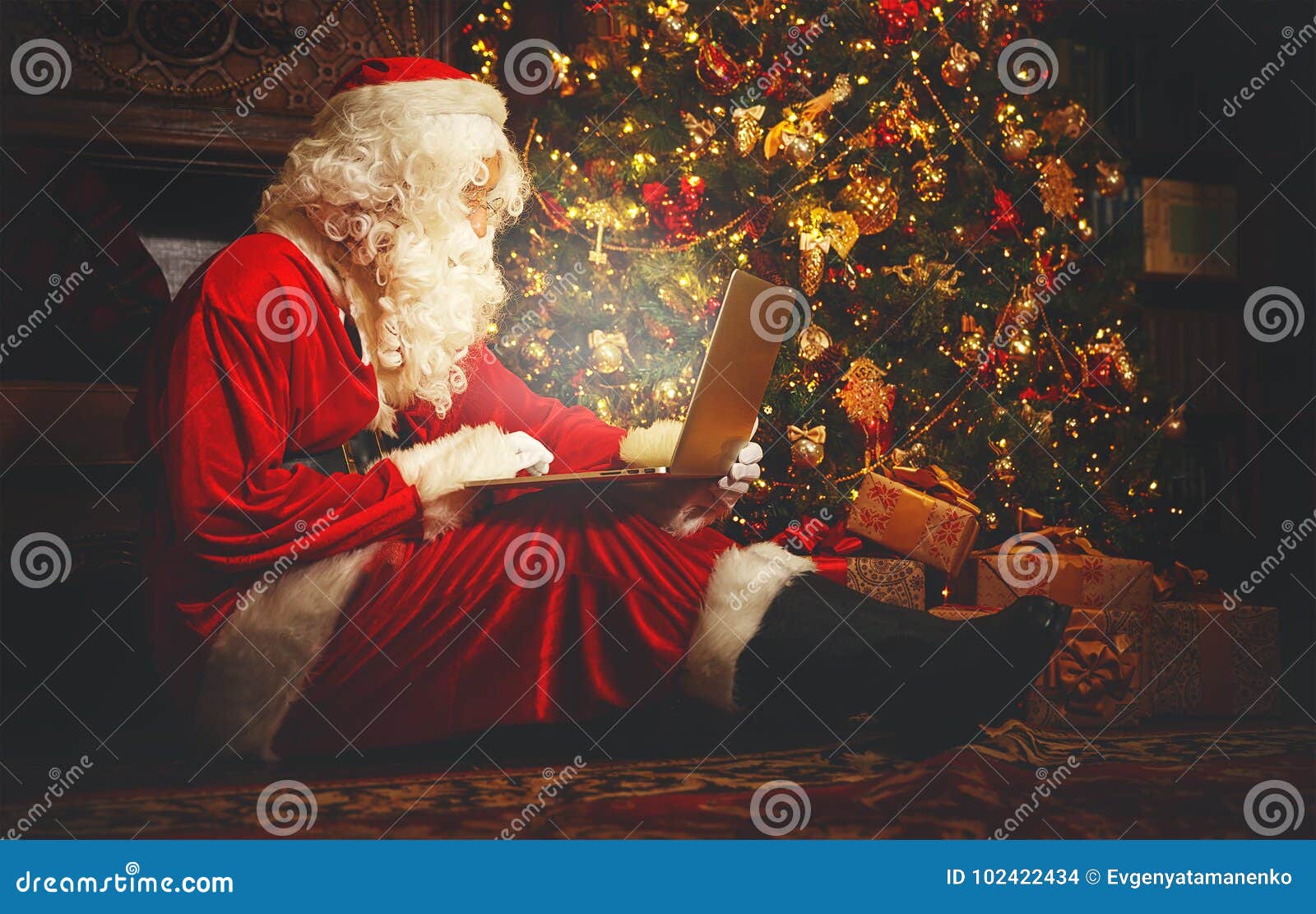 Santa Claus with Computer before Christmas Stock Photo - Image of ...